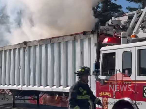 Cardboard in Open-Top Trailer Catches Fire on Freeway
